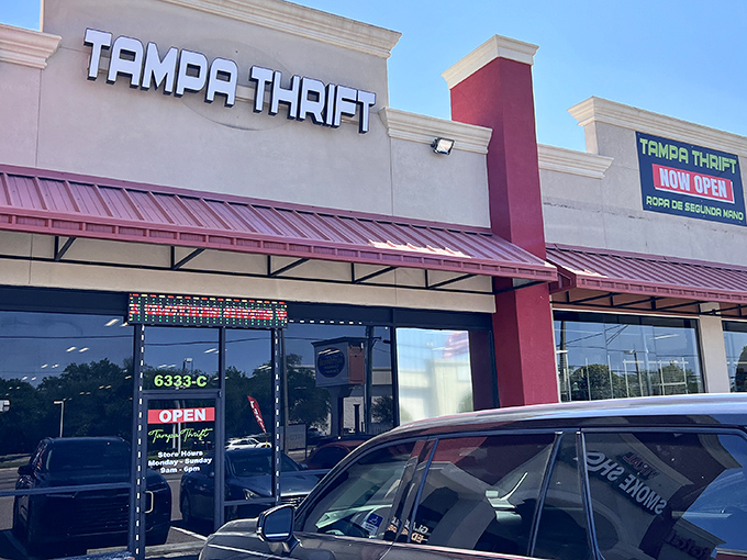 The unassuming storefront of Tampa Thrift beckons bargain hunters with its bold signage – like a treasure chest disguised as a strip mall tenant.
