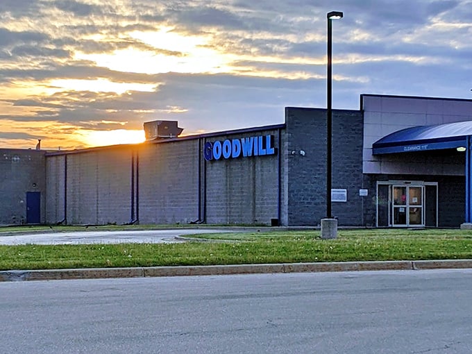 The Goodwill Emporium stands like a blue-signed beacon against the Michigan sky, promising treasure hunters their next great find at sunset. n costco