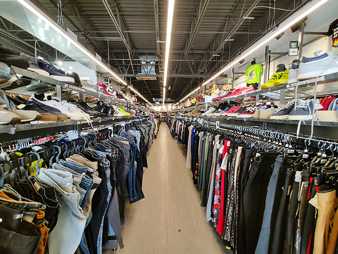 The unassuming storefront of Uptown Cheapskate belies the treasure trove within—like finding a secret portal to designer heaven in a strip mall.