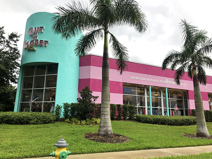 The hot pink facade of Out of the Closet isn't just eye-catching—it's practically screaming "bargains inside!" like a fashionable beacon in St. Petersburg.