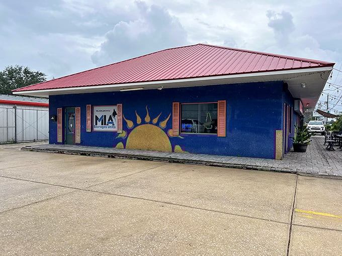 The electric blue exterior of La Cocina isn't just a building—it's a mood announcement. Those string lights promise a fiesta before you even reach for the door handle.