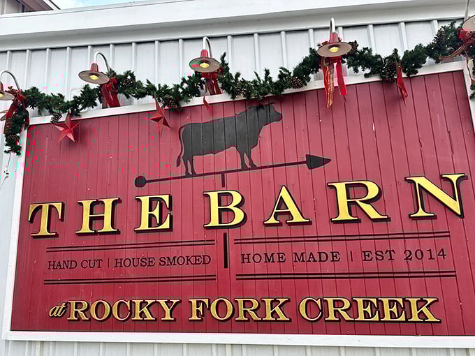 The rustic charm of this barn-turned-steakhouse is no accident—it's architectural theater setting the stage for culinary drama within.