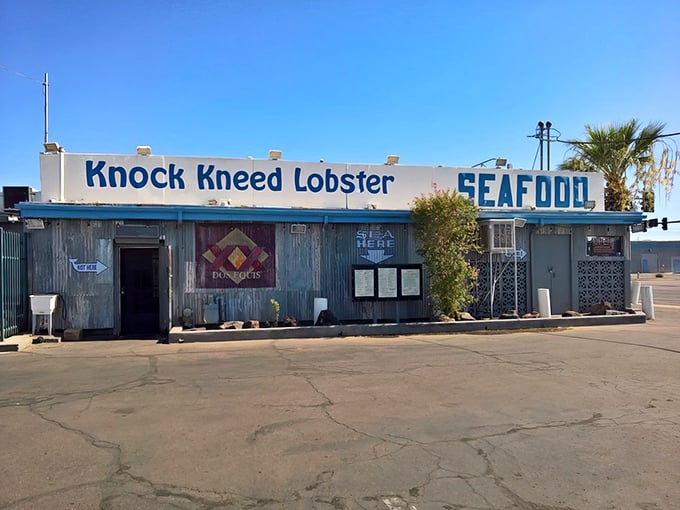The unassuming exterior of Knock Kneed Lobster stands as a testament to the age-old truth: never judge a seafood joint by its corrugated metal siding.