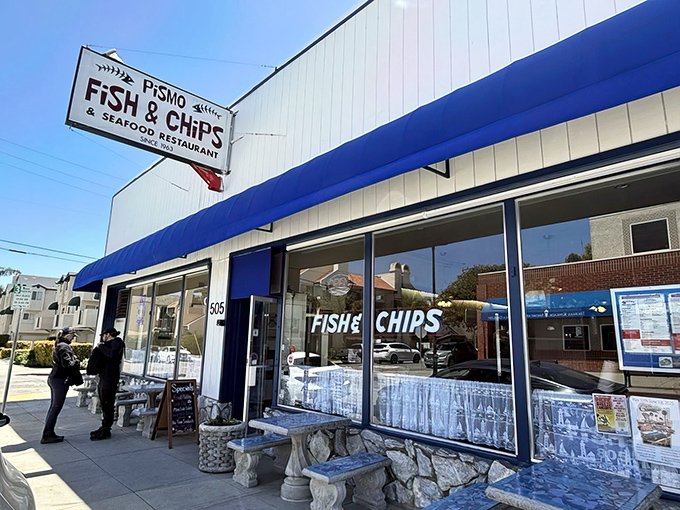 That blue awning beckons like a lighthouse for hungry souls seeking California's coastal treasures.
