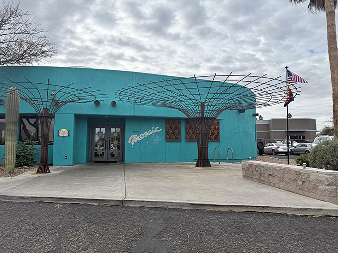 The turquoise exterior isn't just eye-catching—it's a desert mirage that actually delivers on its promise of culinary salvation.