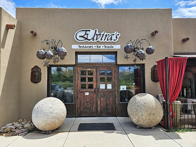 The adobe charm of Elvira's exterior, with those dramatic red curtains, promises a dining experience that's anything but ordinary in quaint Tubac.