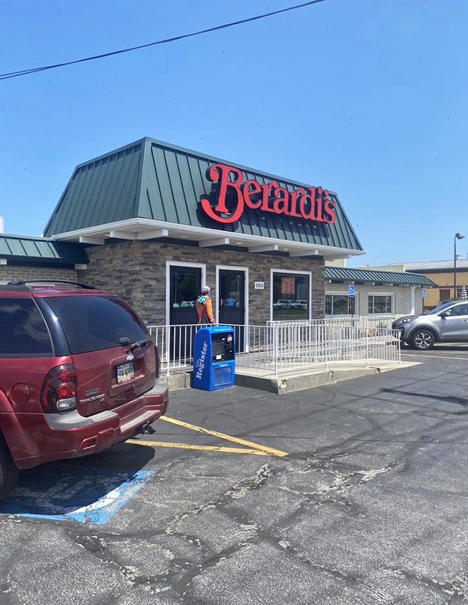 The bold red sign against the stone facade says it all – this isn't just breakfast, it's a Sandusky institution waiting to welcome you home.