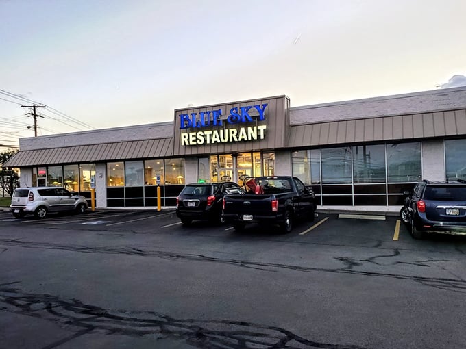 The blue sign beckons like a culinary lighthouse in this strip mall sea. Simple exterior, extraordinary flavors waiting inside.