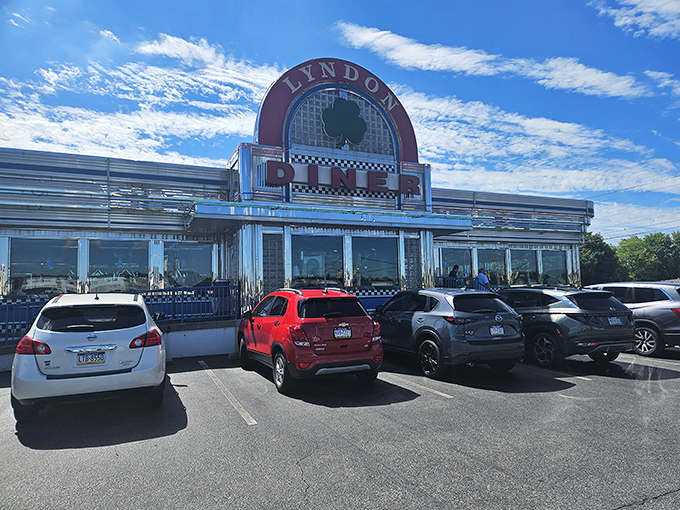 The gleaming chrome exterior of Lyndon Diner shines like a beacon of hope for hungry travelers—a time capsule of Americana serving up comfort on a plate.