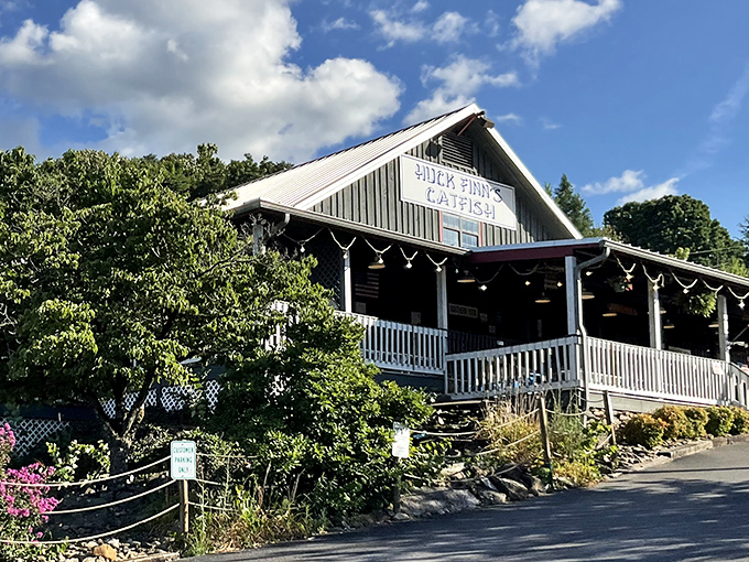 The rustic charm of Huck Finn's exterior promises authentic Southern fare without any pretense—just like the best family reunions.