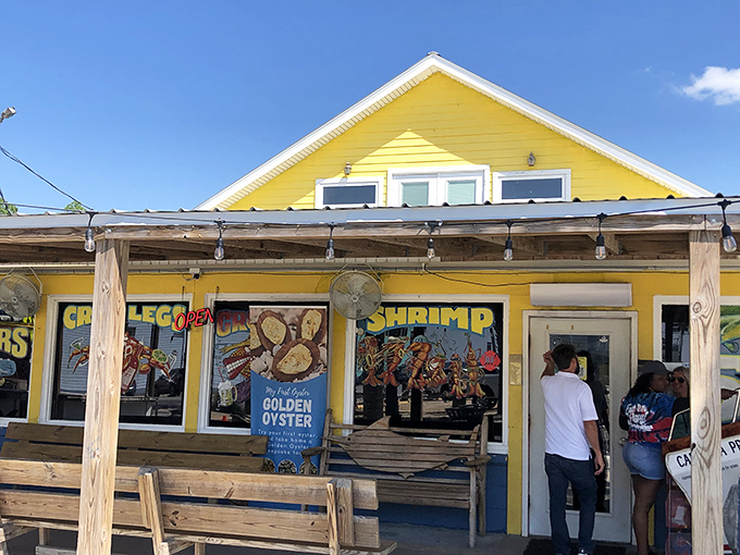 That sunshine-yellow exterior isn't just cheerful—it's a beacon for seafood lovers, promising Gulf treasures within those unassuming walls.