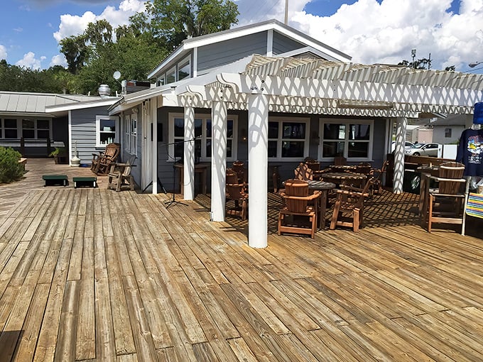 Waterfront dining at its most authentic—weathered wooden decks, Adirondack chairs, and a coastal breeze that seasons every bite better than salt.
