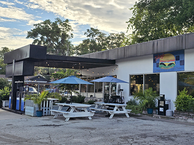 The holy grail of burger joints doesn't need neon signs or valet parking—just a converted gas station, picnic tables, and the promise of greatness within.