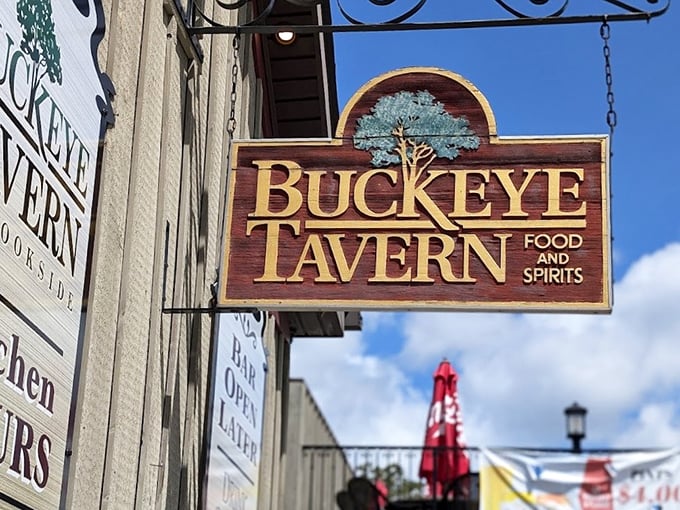 The iconic wooden sign of Buckeye Tavern sways gently in the Pennsylvania breeze, a beacon for hungry travelers since the 1700s.