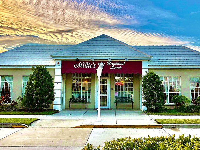 Millie's charming exterior promises little but delivers everything—a burgundy awning beckoning breakfast lovers like a culinary lighthouse on Sarasota's shore.