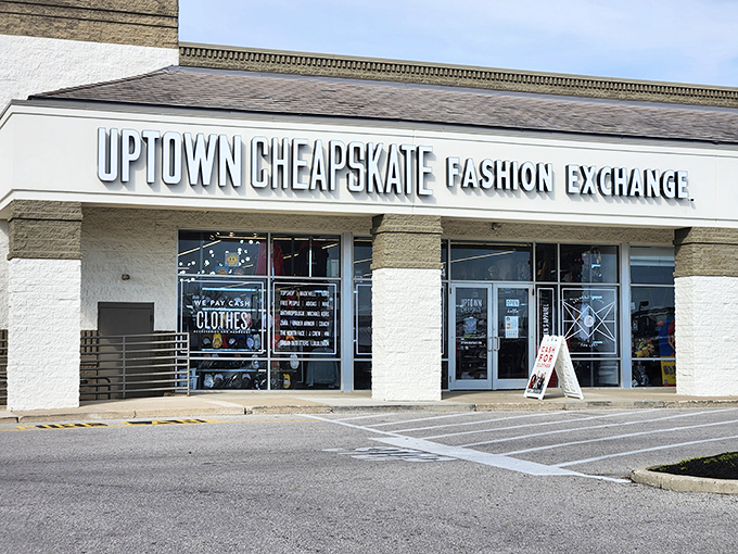 The unassuming storefront of Uptown Cheapskate belies the treasure trove within—like finding a secret portal to designer heaven in a strip mall.