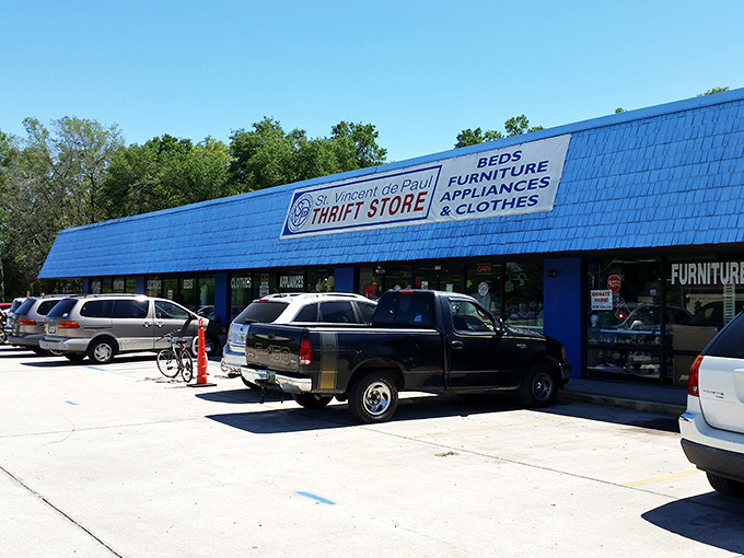 The iconic blue roof of St. Vincent de Paul Thrift Store stands out like a bargain-hunter's North Star, guiding savvy shoppers to treasure-filled aisles within.