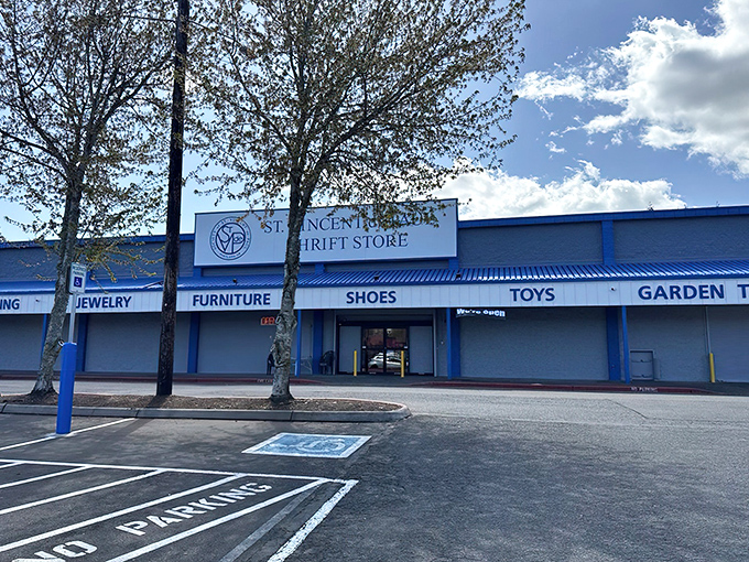 The blue-trimmed facade of St. Vincent de Paul isn't just a storefront—it's a portal to treasure hunting adventures that won't break the bank.