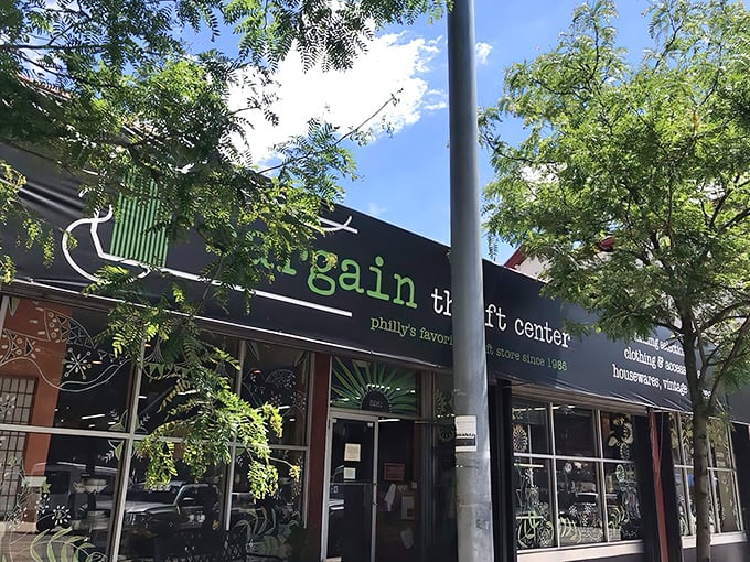 The sleek black storefront with bright green lettering promises treasures within—Philadelphia's favorite hunting ground for the thrifty and the curious.