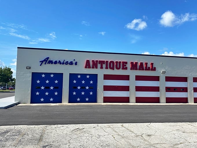 The patriotic facade of America's Antique Mall isn't subtle – it's like Uncle Sam and Betsy Ross collaborated on a warehouse makeover.