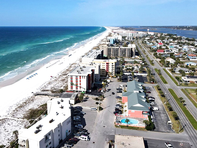 Aerial paradise where emerald waters meet sugar-white sands. Fort Walton Beach's beachfront condos offer front-row seats to nature's greatest show.