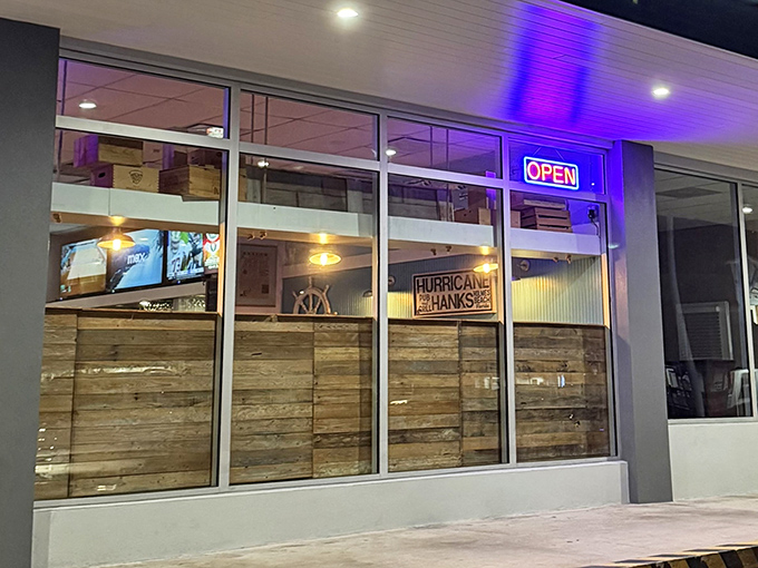The iconic blue lettering of Hurricane Hanks promises three essentials for Florida happiness: great food, cocktails, and craft beer.