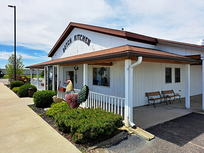 The unassuming white exterior of Dutch Kitchen welcomes hungry travelers like a lighthouse guiding ships to harbor—except this beacon promises pancakes instead of safety.