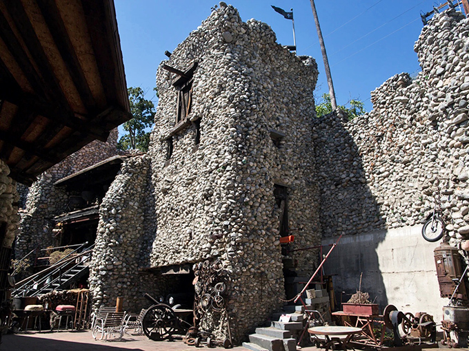 Stone upon stone, a DIY medieval fantasy rises in suburban Glendora. This isn't Disneyland's carefully engineered magic—it's something far more authentic.