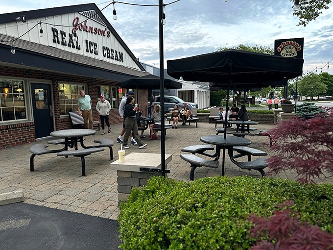 The classic white-gabled facade of Johnson's beckons like an ice cream lighthouse, guiding sweet-toothed pilgrims to their creamy destination since 1950.