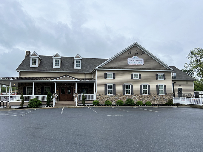 The farmhouse-style exterior of Fox Meadows Creamery welcomes visitors like a dairy-filled Shangri-La. This isn't just a pit stop—it's a destination.