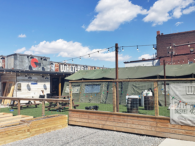 Walter's rustic outdoor setup is like finding a secret BBQ clubhouse. String lights, wooden decks, and that unmistakable smoky aroma welcome you to Pittsburgh's meat paradise.