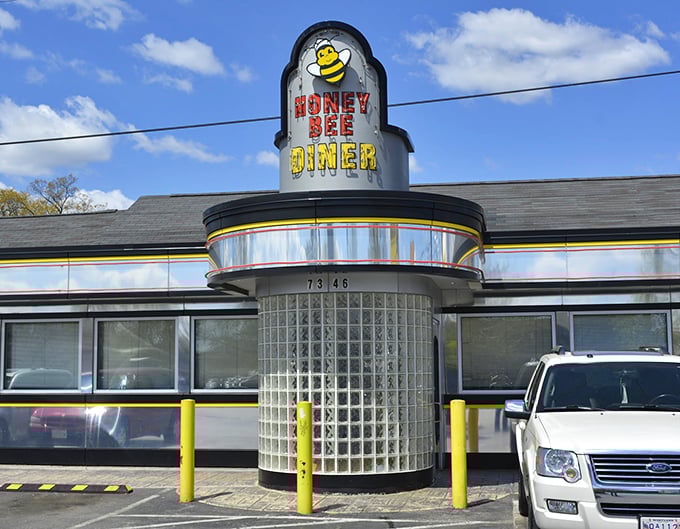 The classic mid-century architecture of Honey Bee Diner stands proudly in Glen Burnie, its cheerful bee logo promising sweet comfort inside.