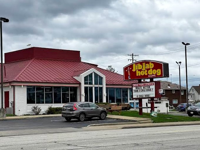 The iconic red roof of Jib Jab Hot Dog Shoppe stands as a beacon of hope for the hungry traveler. This Girard landmark promises comfort food paradise within.