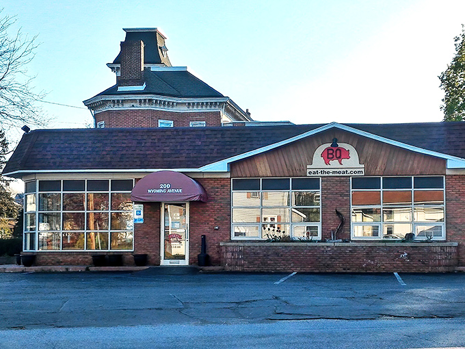The blue pickup truck isn't just decoration—it's a beacon signaling you've arrived at barbecue nirvana in Swoyersville's unassuming brick building.