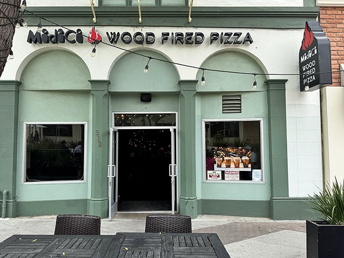 The mint-green façade of MidiCi beckons pizza lovers like a siren song on Ventura's Main Street. Simplicity with style.
