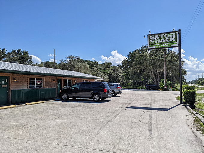 The rustic wooden exterior of The Gator Shack hints at Florida flavors served without fuss. That name on the sign? It’s a beacon for hungry souls chasing bold, local bites.