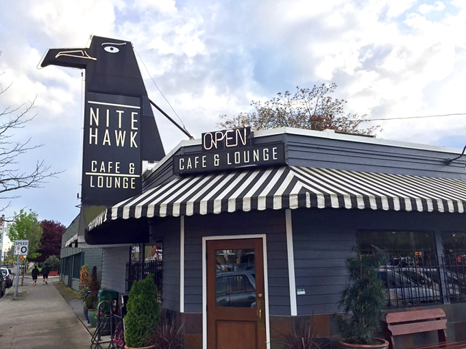 That iconic black hawk silhouette against the Portland sky isn't just a sign—it's a beacon calling hungry souls to comfort food paradise.