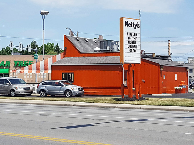 Netty's iconic orange and white striped exterior isn't just a building—it's a Toledo landmark that practically screams "happiness served here!"