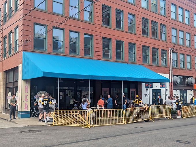 That turquoise awning isn't just a color choice – it's a beacon calling hungry souls to breakfast nirvana.
