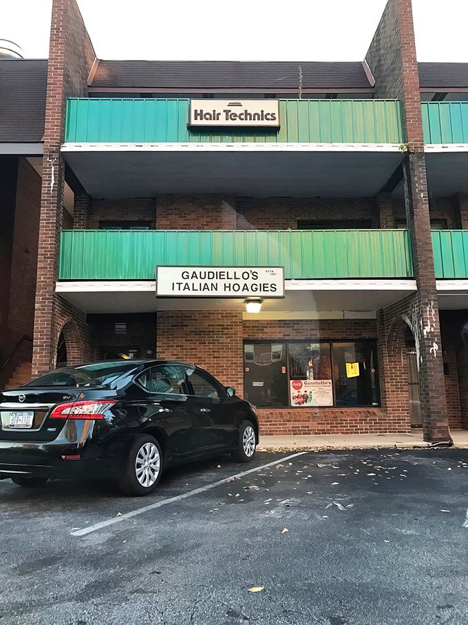 Don't let the modest storefront fool you – beneath that sign lies a sandwich paradise that's worth every mile of your journey.