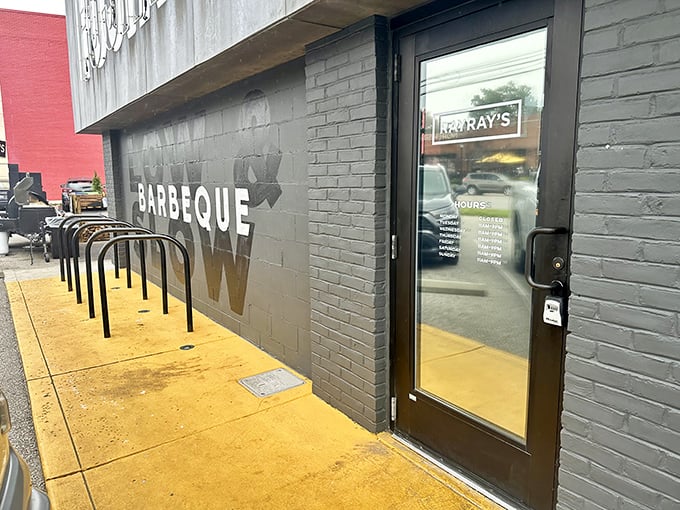 The unassuming black brick exterior of Ray Ray's might not scream "food paradise," but that's how the best BBQ joints operate—letting the smoke do the talking.