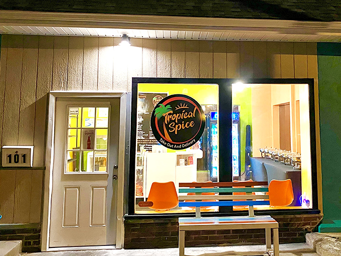 The turquoise beacon of Tropical Spice stands out like a Caribbean island dropped into the Virginia landscape, promising culinary adventures behind its modest façade.