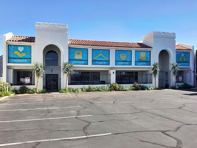 The desert sun gleams off Thrift to Thrive's iconic blue and white façade, where "Vintage," "Thrift," "Coffee," and "Local" aren't just words—they're promises kept.