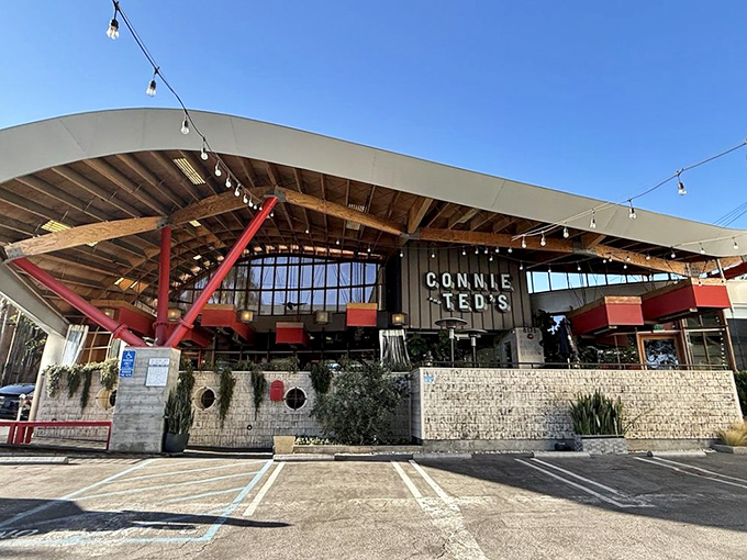 The architectural marvel that is Connie and Ted's stands out with its wave-like roof and inviting string lights—New England seafood with California architectural flair.
