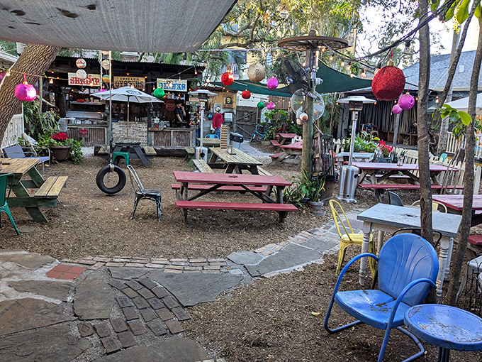 The backyard at Owen's feels like stumbling into the best block party in Florida – colorful, quirky, and completely unforgettable.