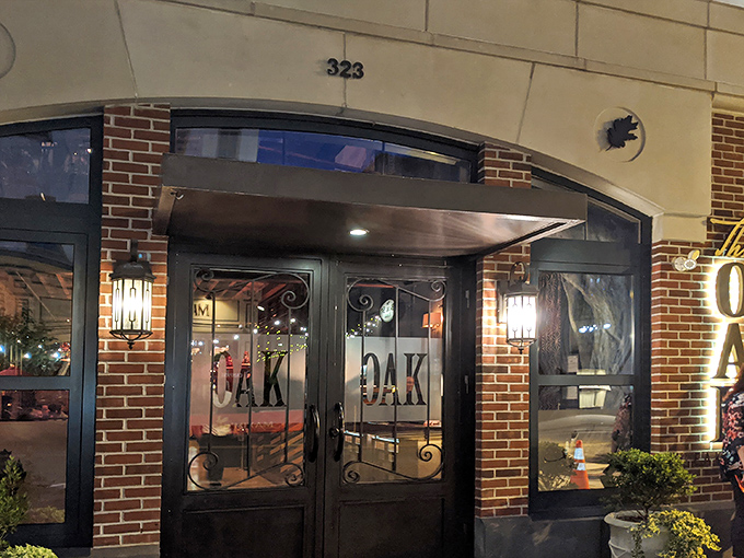 Three Oak Steakhouse stands proudly on its Easton corner, its classic brick façade promising culinary adventures within. The cobalt planters add just the right pop of color.