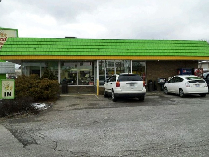That iconic lime green roof isn't just a landmark—it's a beacon of hope for anyone who believes breakfast should involve sugar and joy.