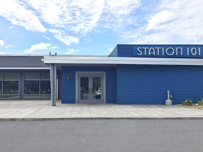 The blue facade of Station 101 stands like a culinary lighthouse in DuBois, beckoning hungry travelers with its modern, clean lines and promise of good eats.