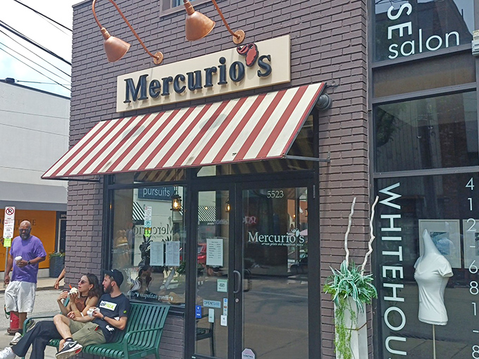 Mercurio's charming brick exterior in Pittsburgh's Shadyside neighborhood beckons with its classic red and white awning—like a little slice of Italy nestled between urban storefronts.