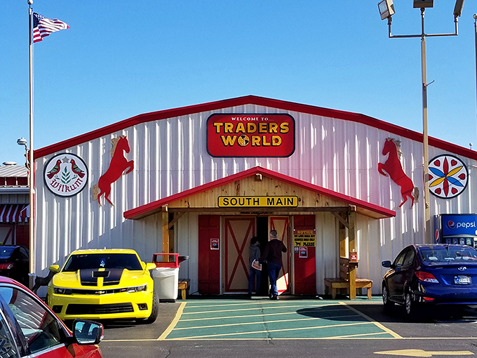 The iconic red-trimmed entrance to Traders World stands like a retail Narnia wardrobe—step through those doors and enter a wonderland of possibilities.
